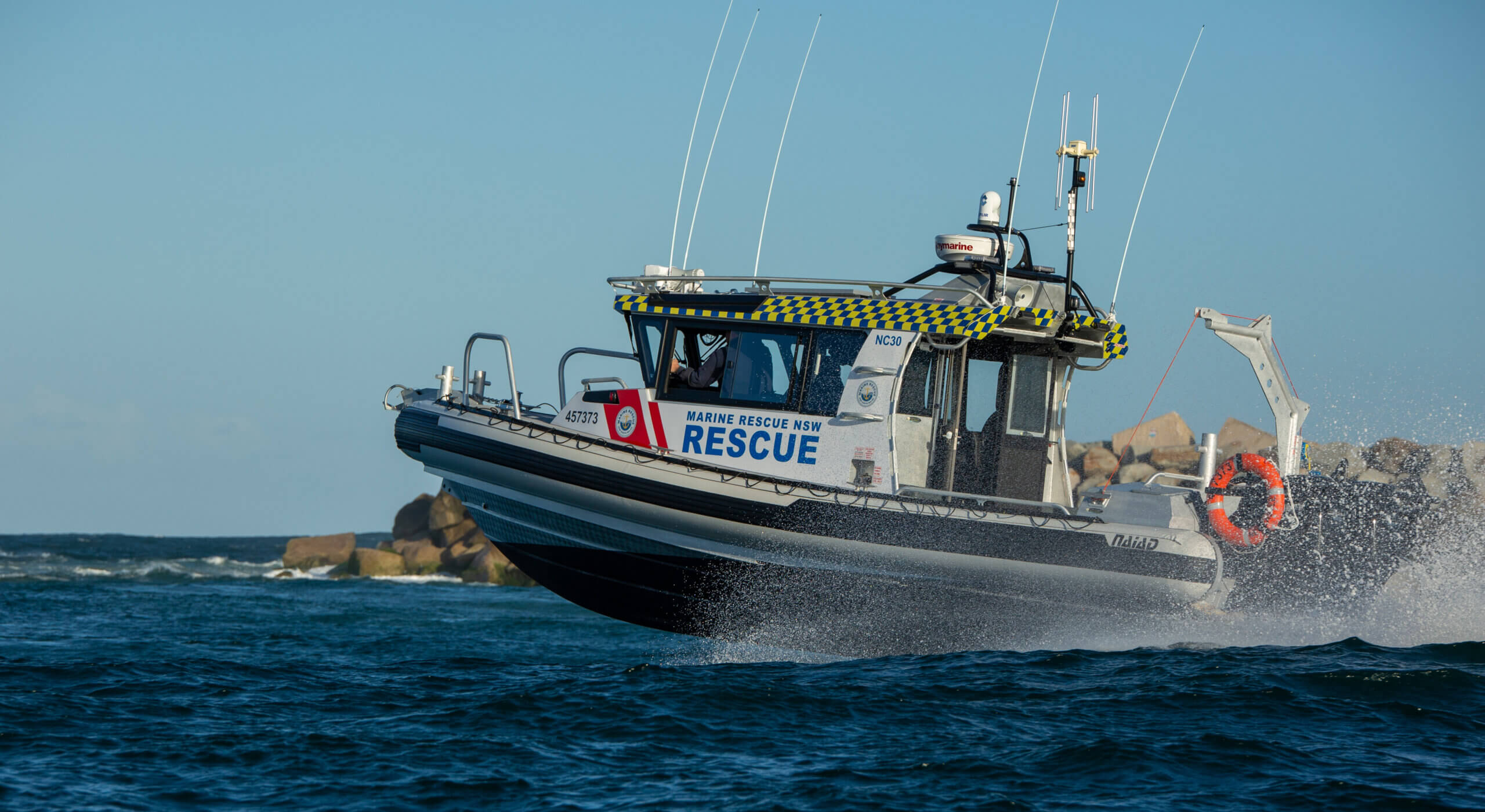 Marine Rescue NSW volunteers assist search for missing swimmer off ...